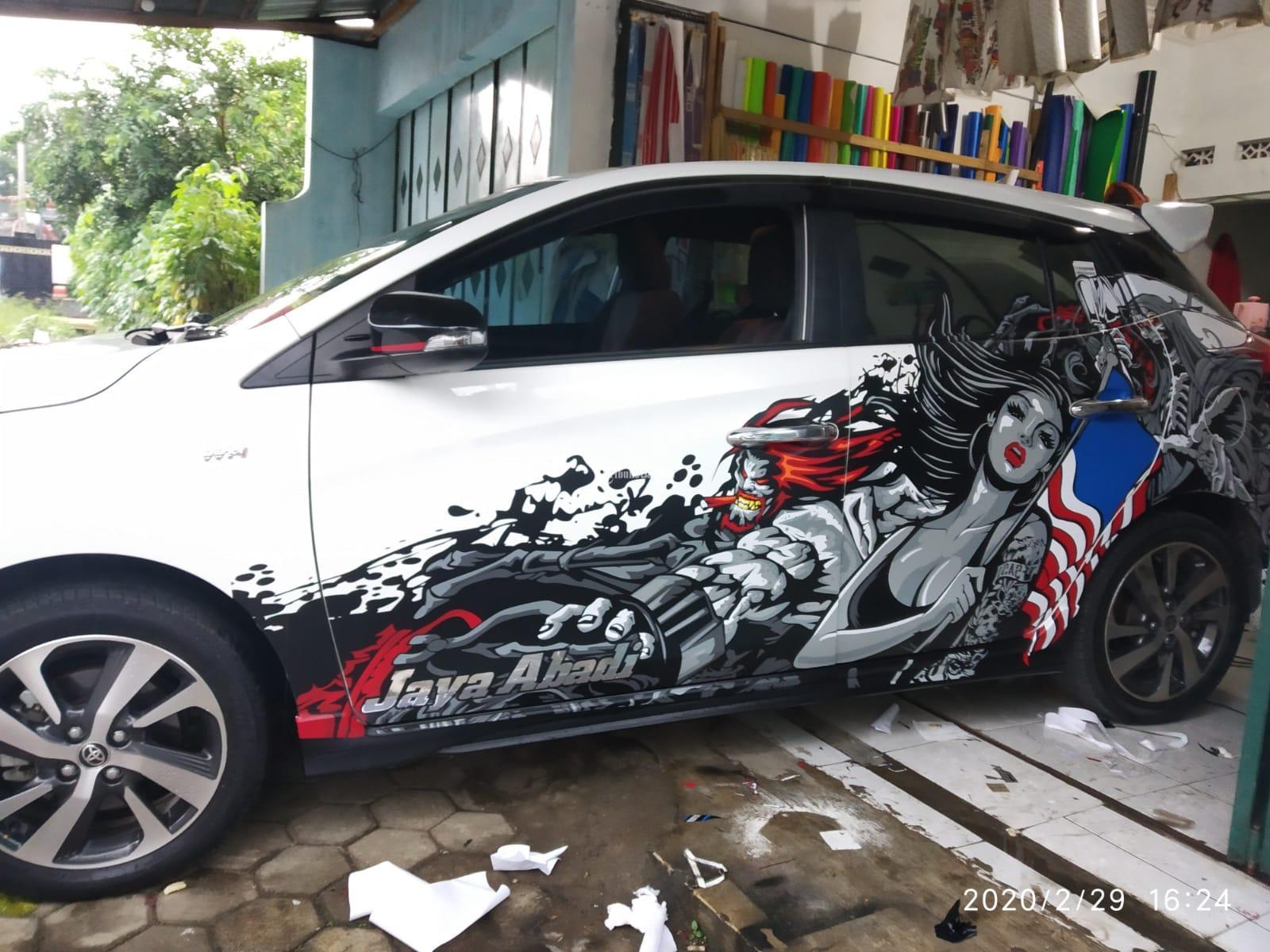 Wrapping Branding Mobil - Tribun JualBeli